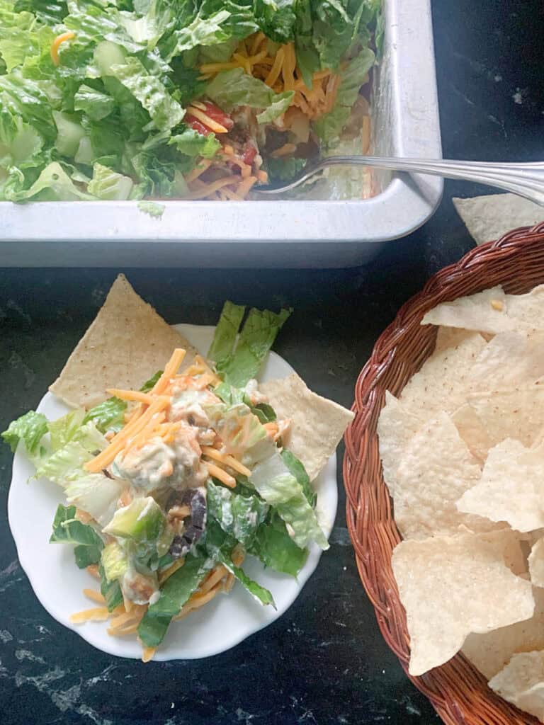 Fresh & Creamy Layered Taco Dip (to feed a crowd) - Lora Bloomquist ...
